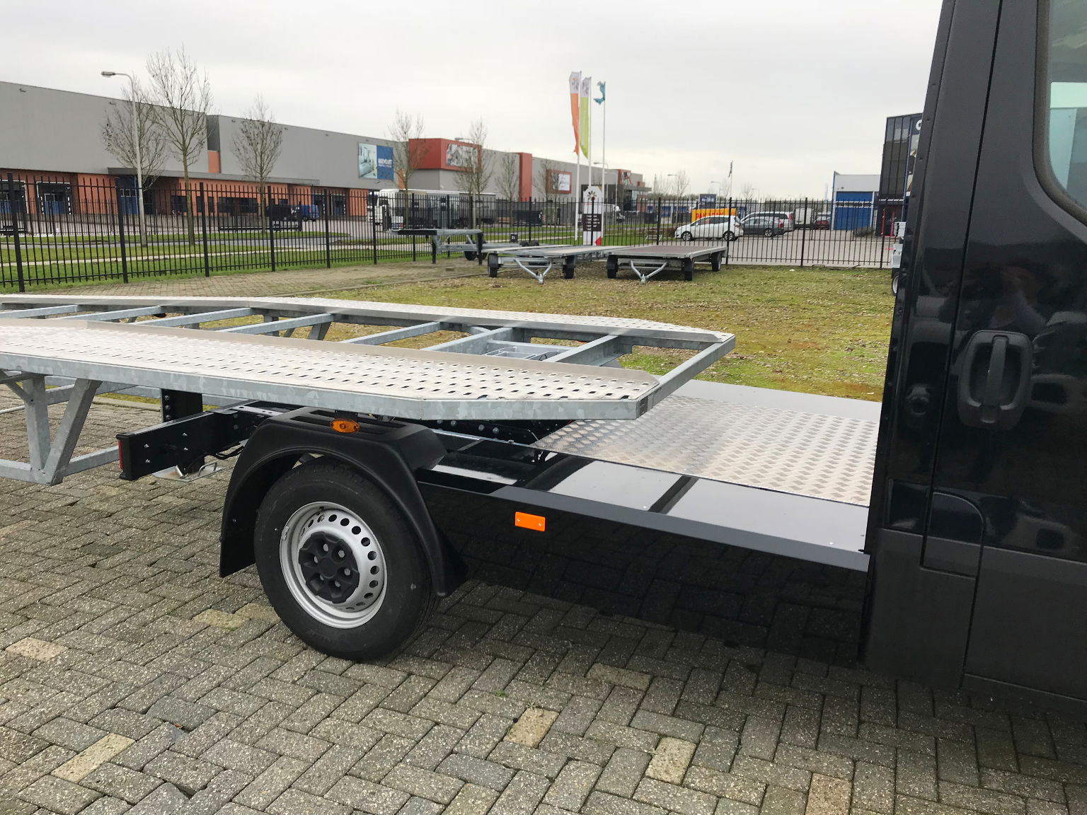 Car transporter trailer, 12 meters in length, behind chassis cab ...
