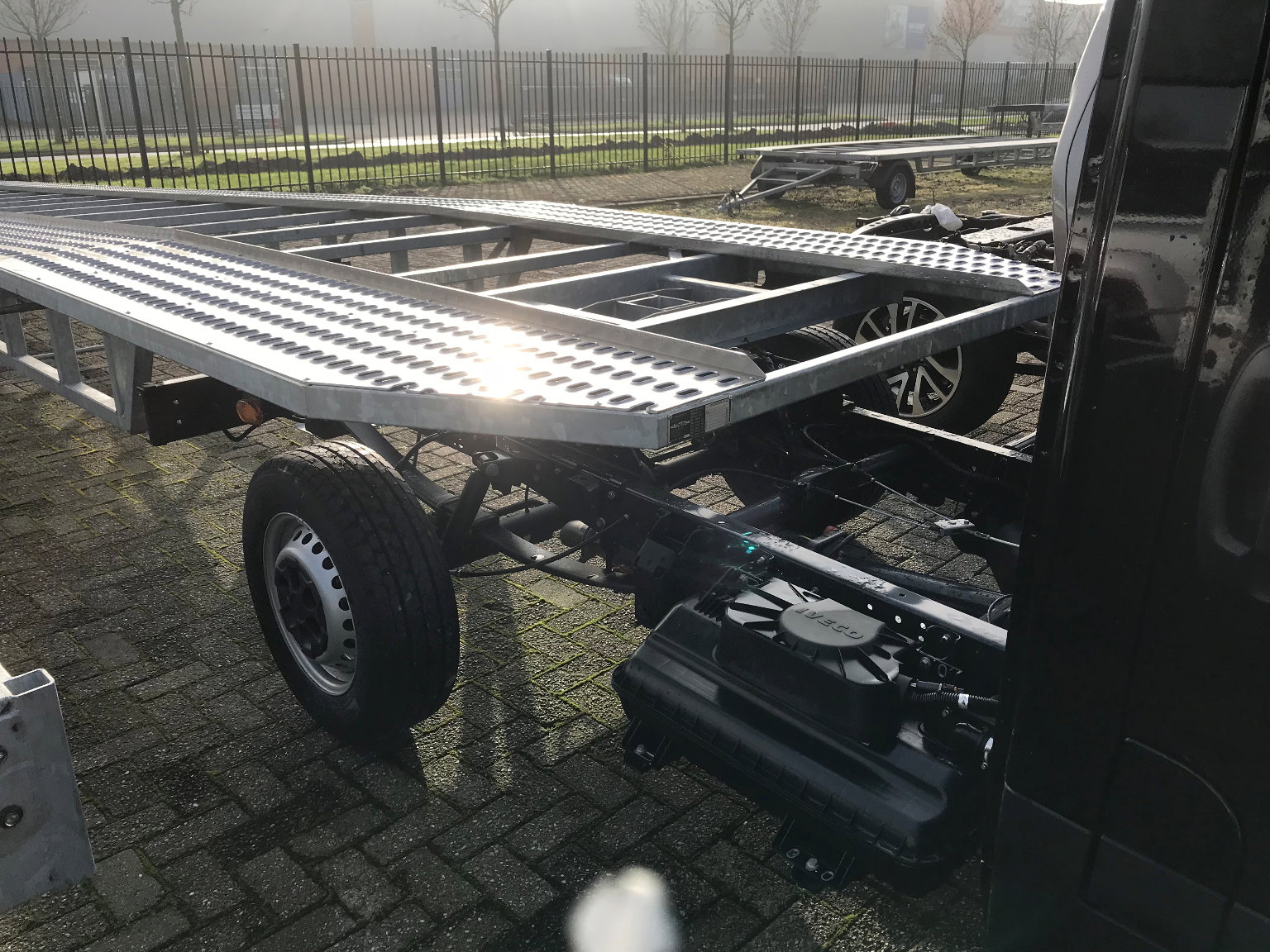 Car transporter trailer, 12 meters in length, behind chassis cab ...